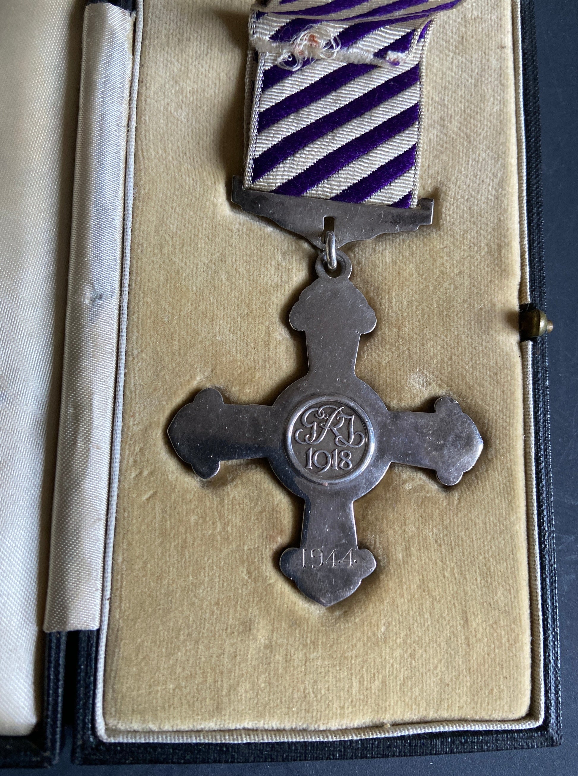 Distinguished Flying Cross in original case, dated 1944, a nice mint e ...